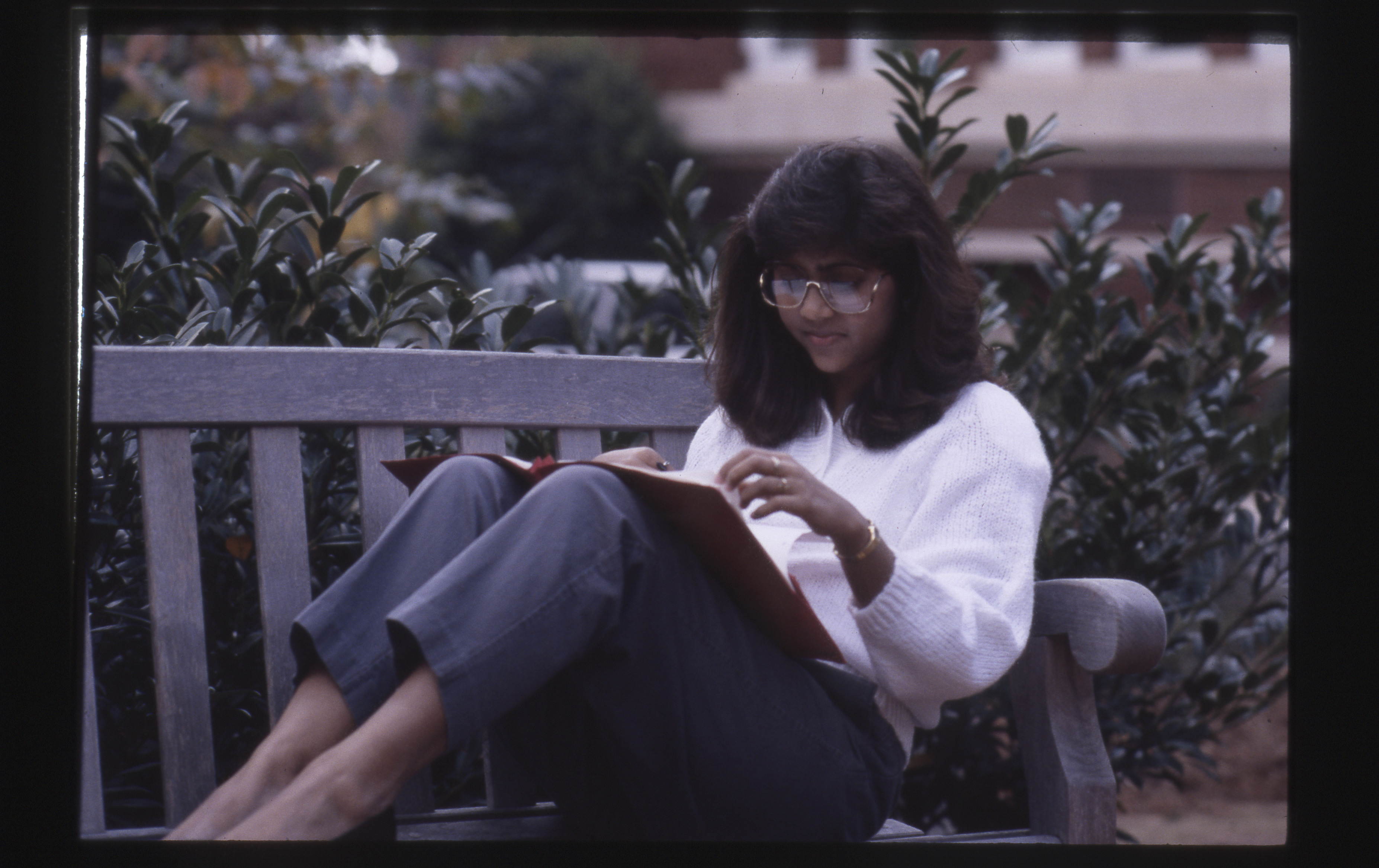 Queens College Student Seated on a Bench