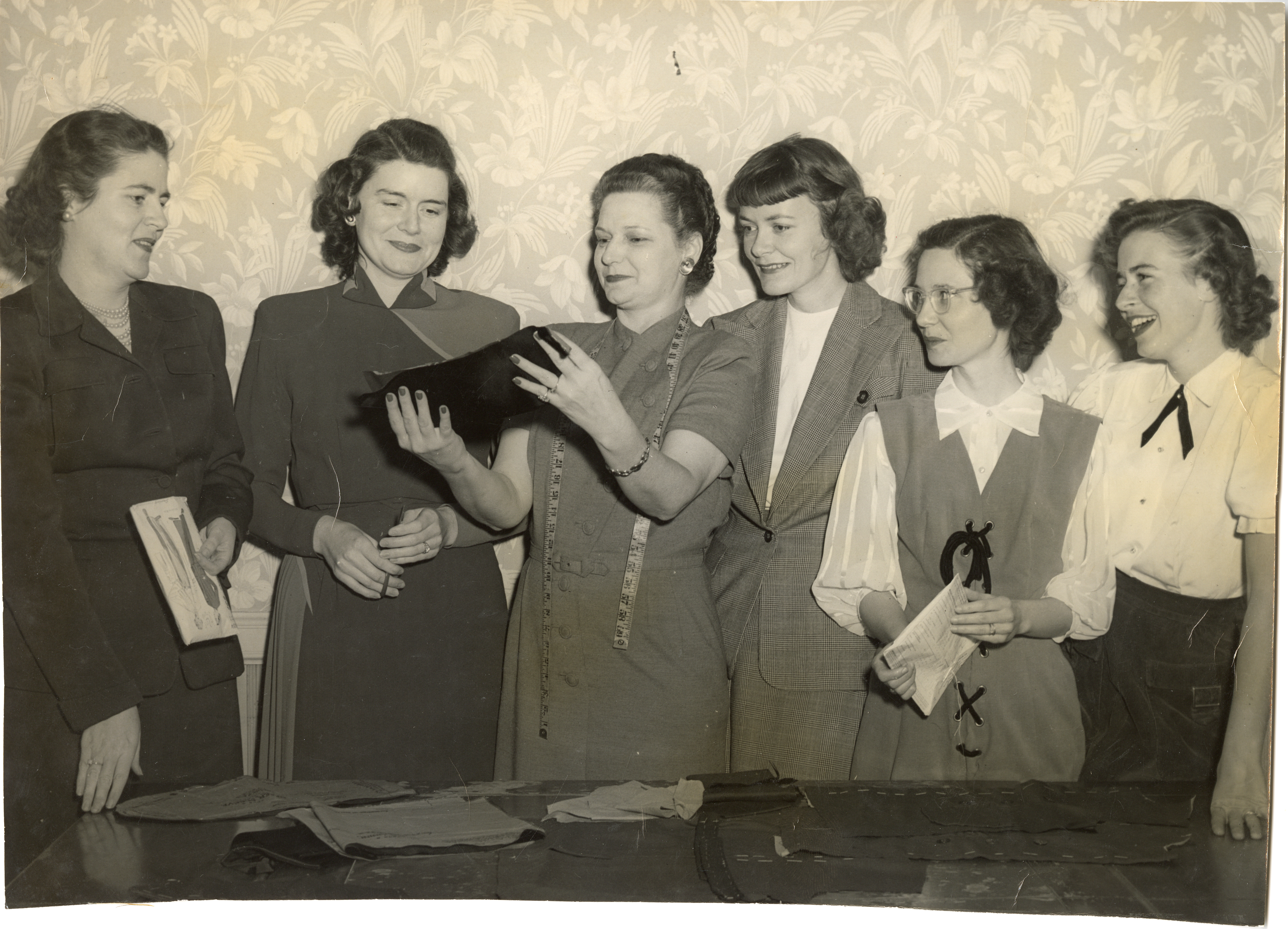 A class in sewing taught by Mrs. Ed Mann was sponsored by the Young Y ...